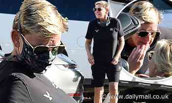 Ellen DeGeneres gets flirty with Portia de Rossi as they pick up food ...