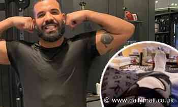 Drake shows off his lean physique during a workout... 10 weeks after ...