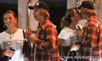 Aussie rapper The Kid Laroi shares a passionate kiss with his ...