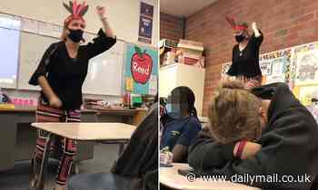 Math teacher is placed on leave for wearing feather headdress and ...