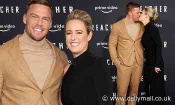 Alan Ritchson shares sweet kiss with wife Catherine at premiere of ...